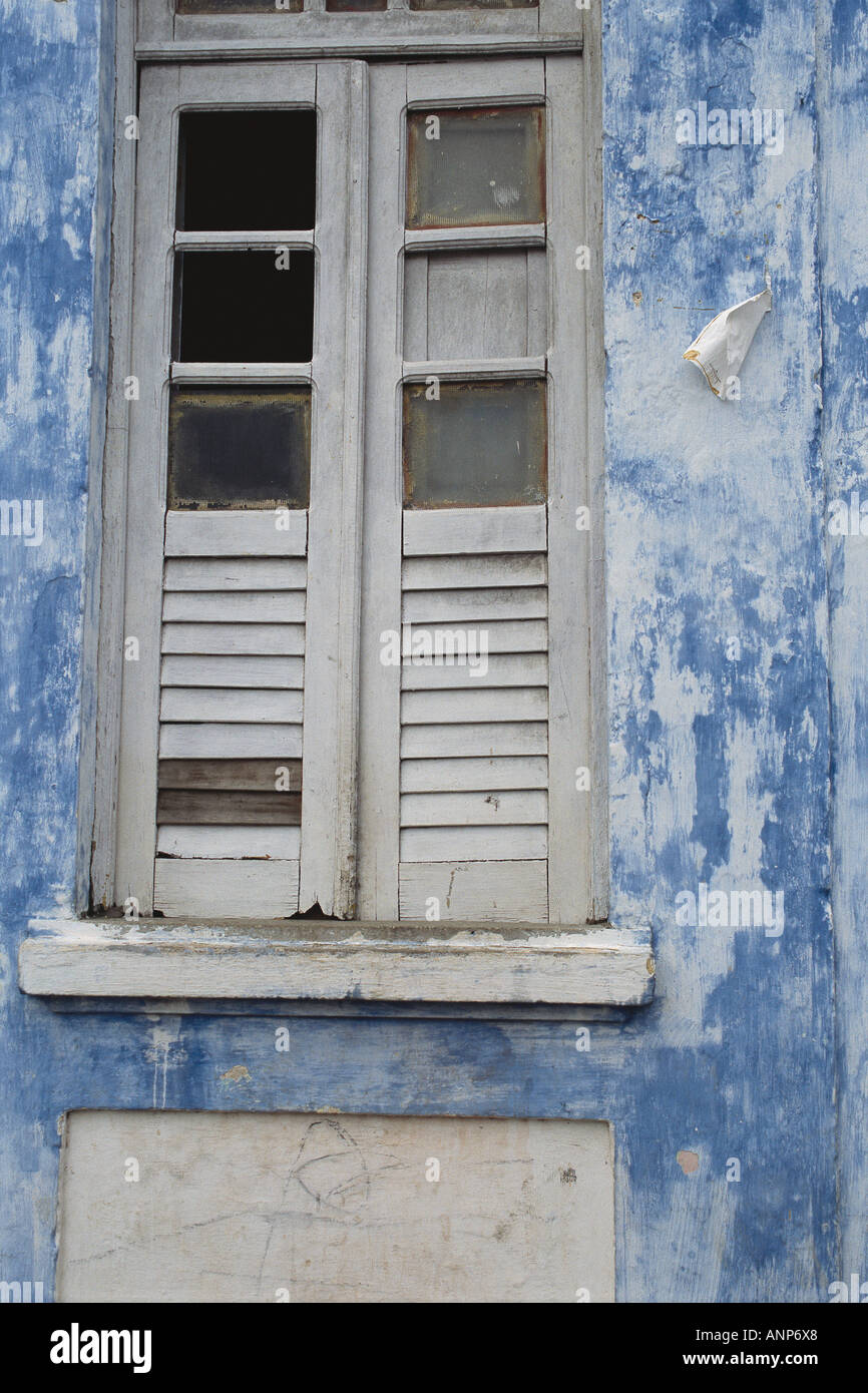 Low angle view of broken shutter of a window Stock Photo - Alamy