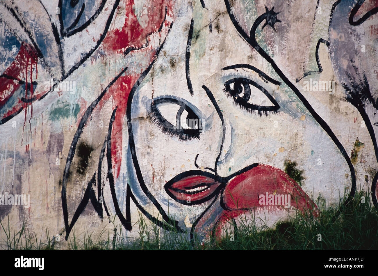 Graffiti of a human face on a wall Stock Photo - Alamy