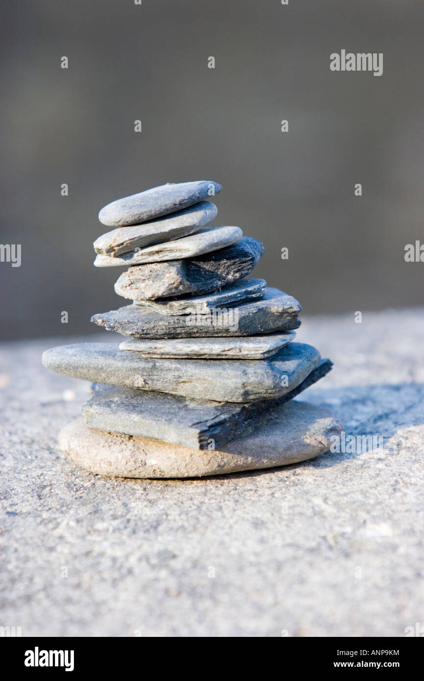 A pile of flat pebbles Stock Photo - Alamy