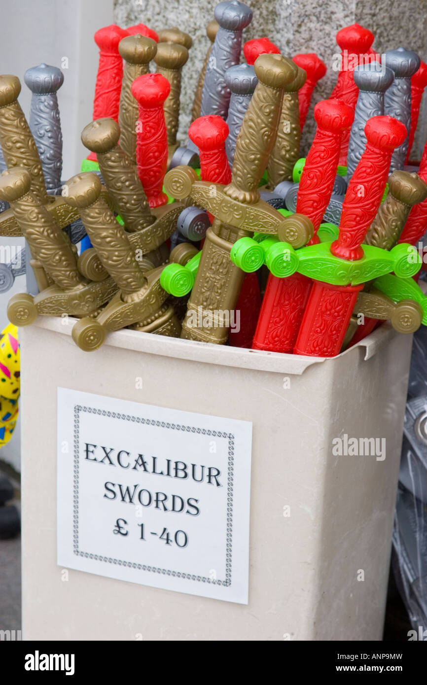 Plastic Excalibur swords for sale in a toy shop Stock Photo - Alamy