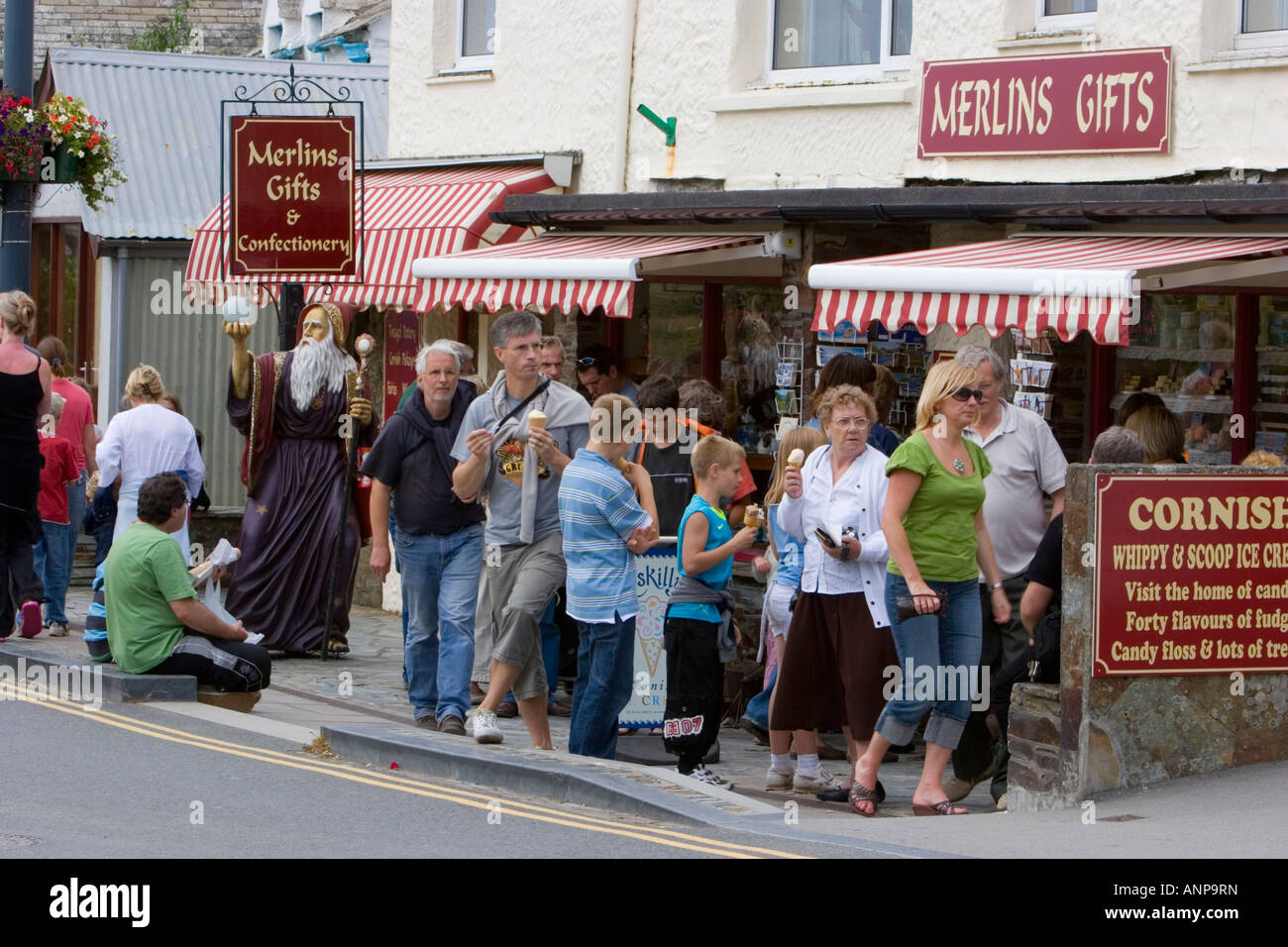 Street scene in Tintagel North Cornwall showing crowds of visitors and ...