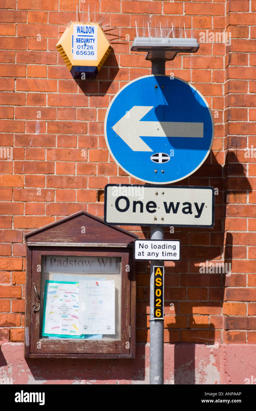 One way street sign and noticeboard Stock Photo - Alamy