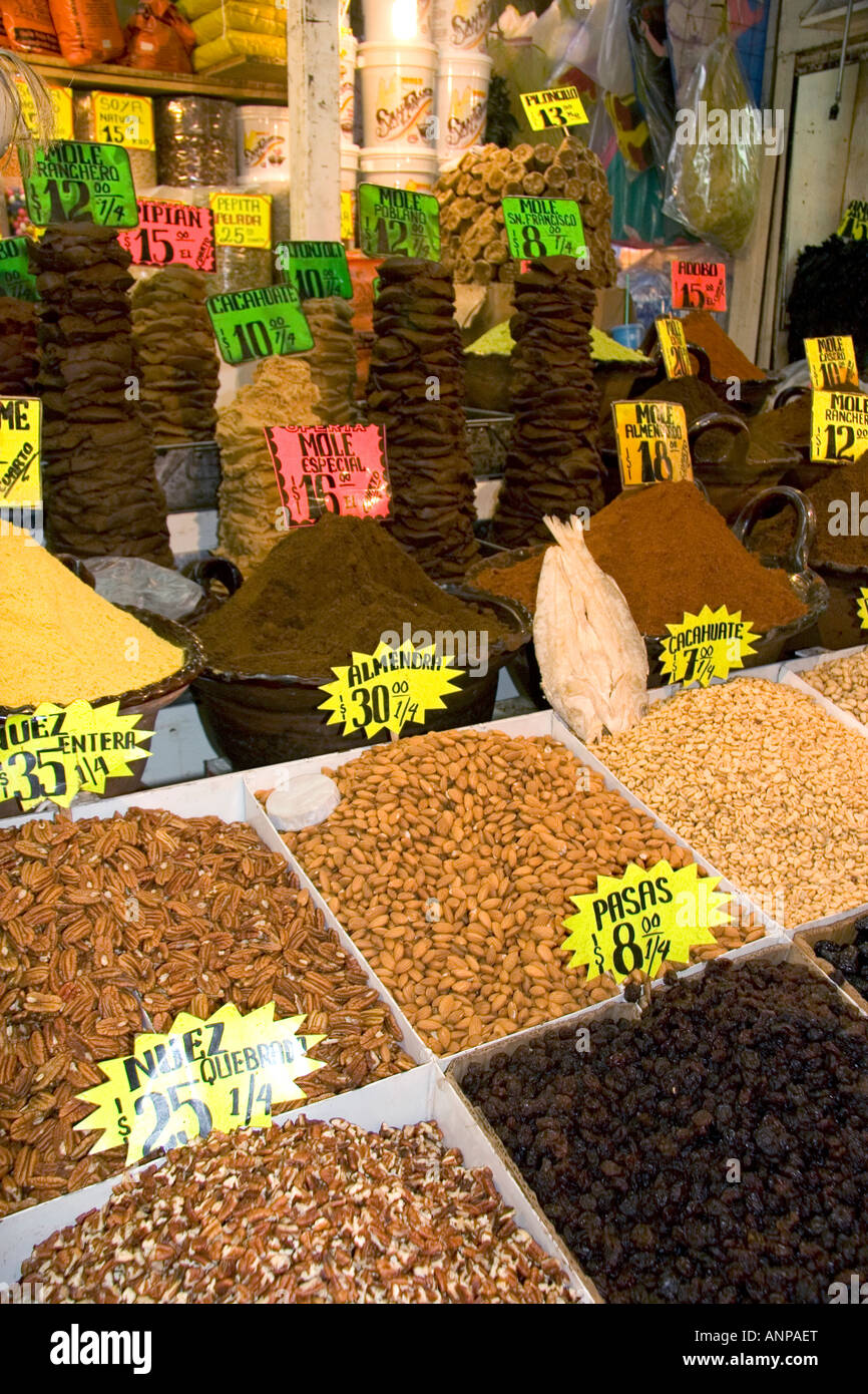 A variety of nuts and moles for sale at the Merced Market in Mexico ...