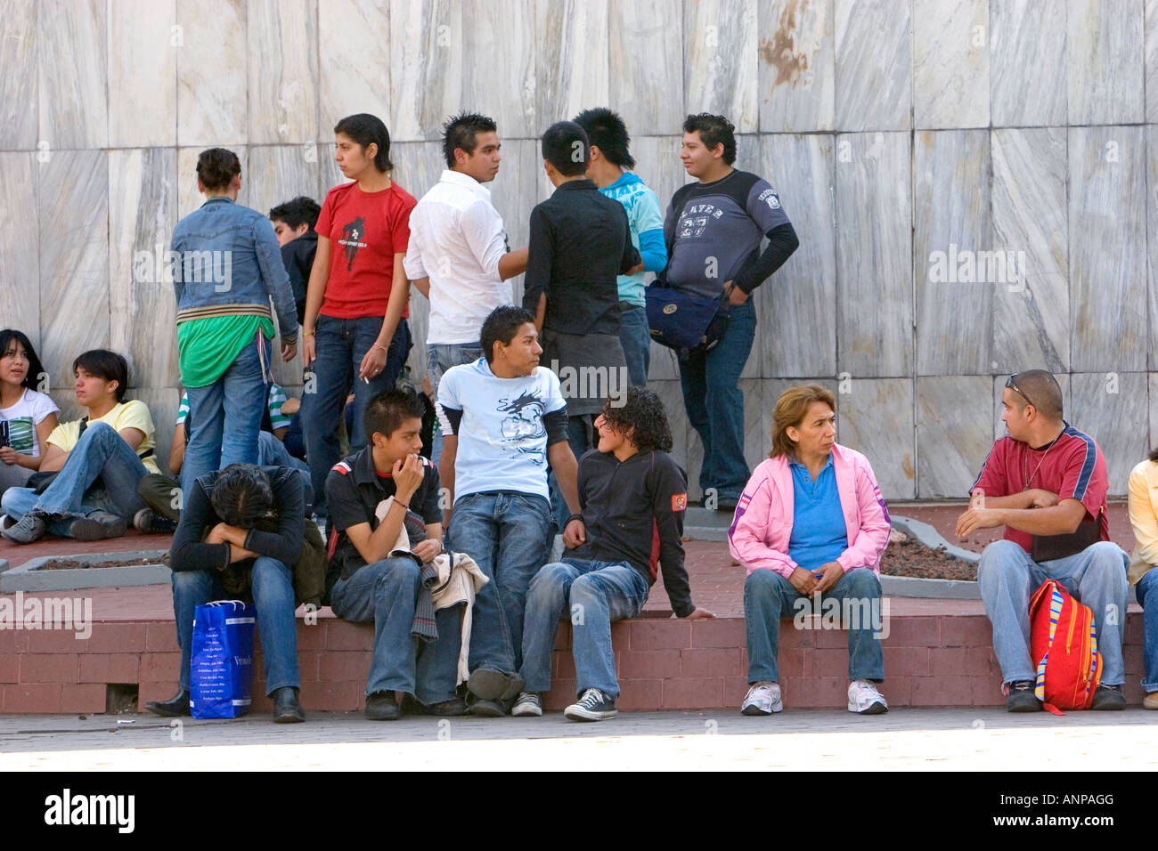 Young Mexicans hanging out at Insurgentes Plaza in Mexico City Mexico ...