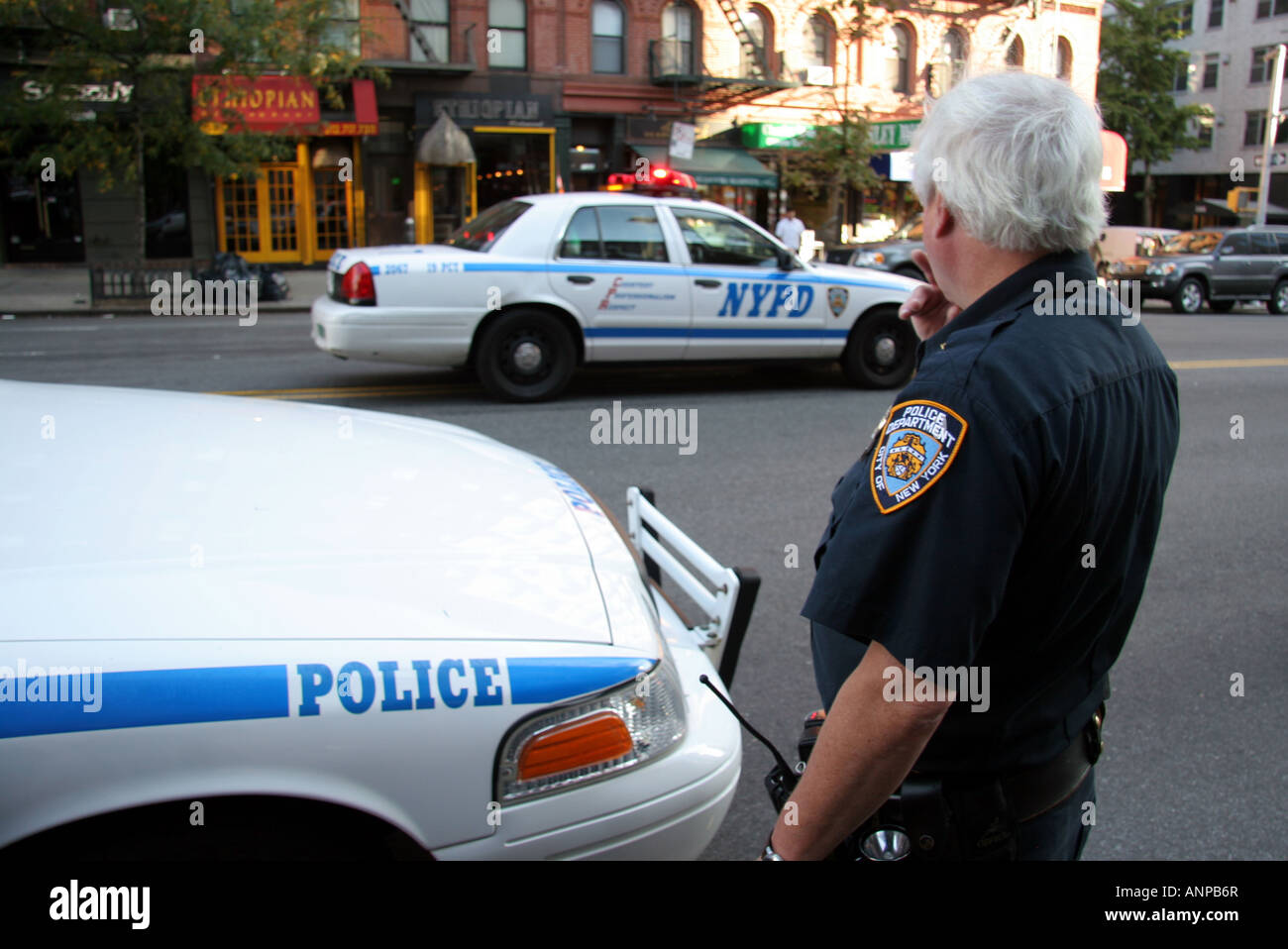NYPD New York Cop and Cars Stock Photo - Alamy