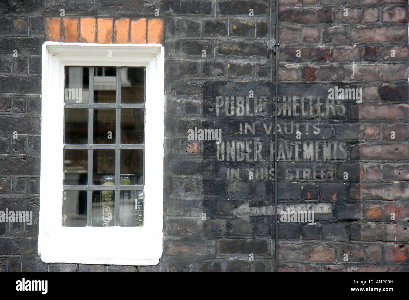 World War Two bomb shelter sign in a London Street Stock Photo - Alamy