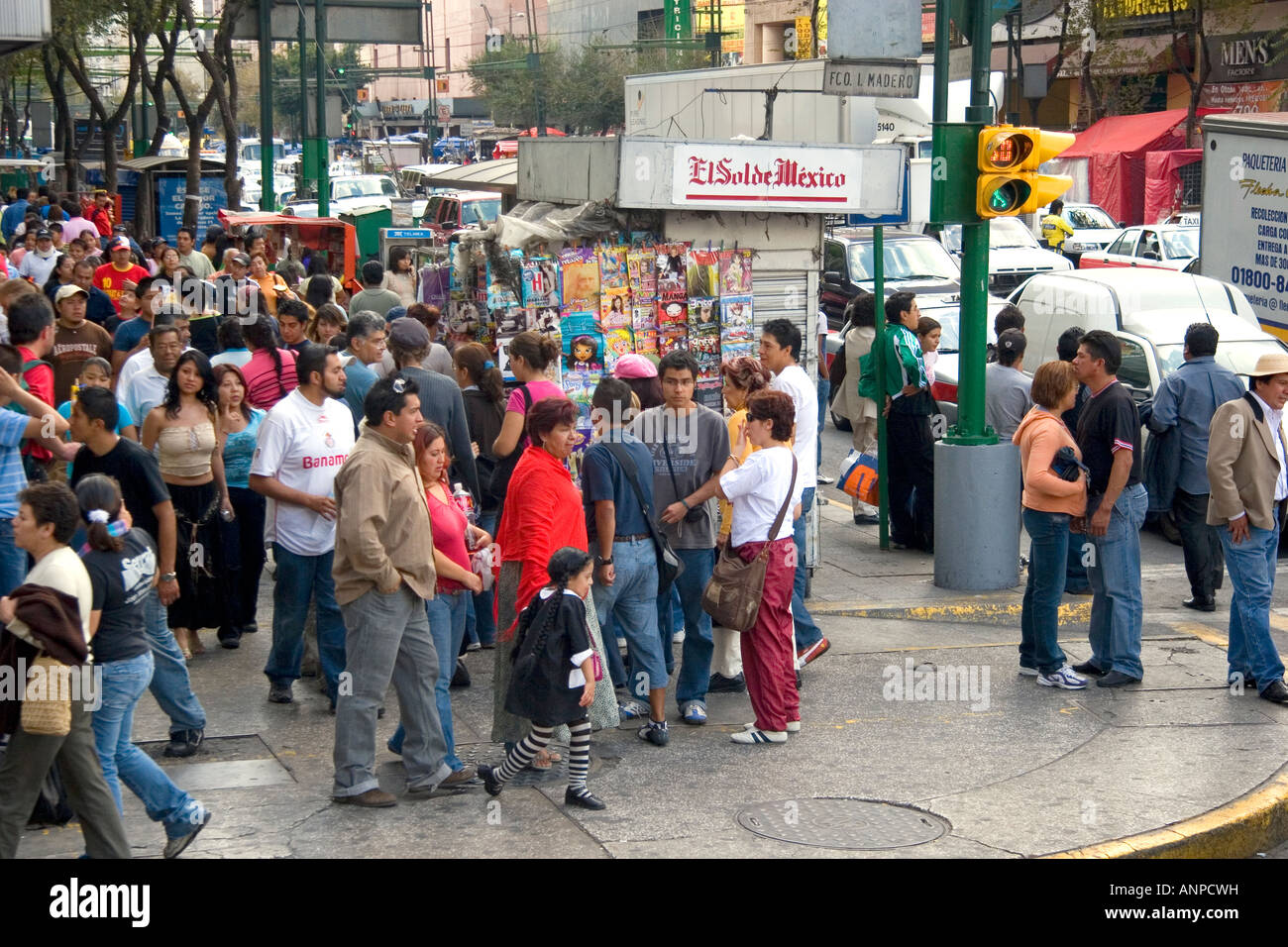 Pedestrians at the intersection of Paseo de la Reforma and Eje Central ...