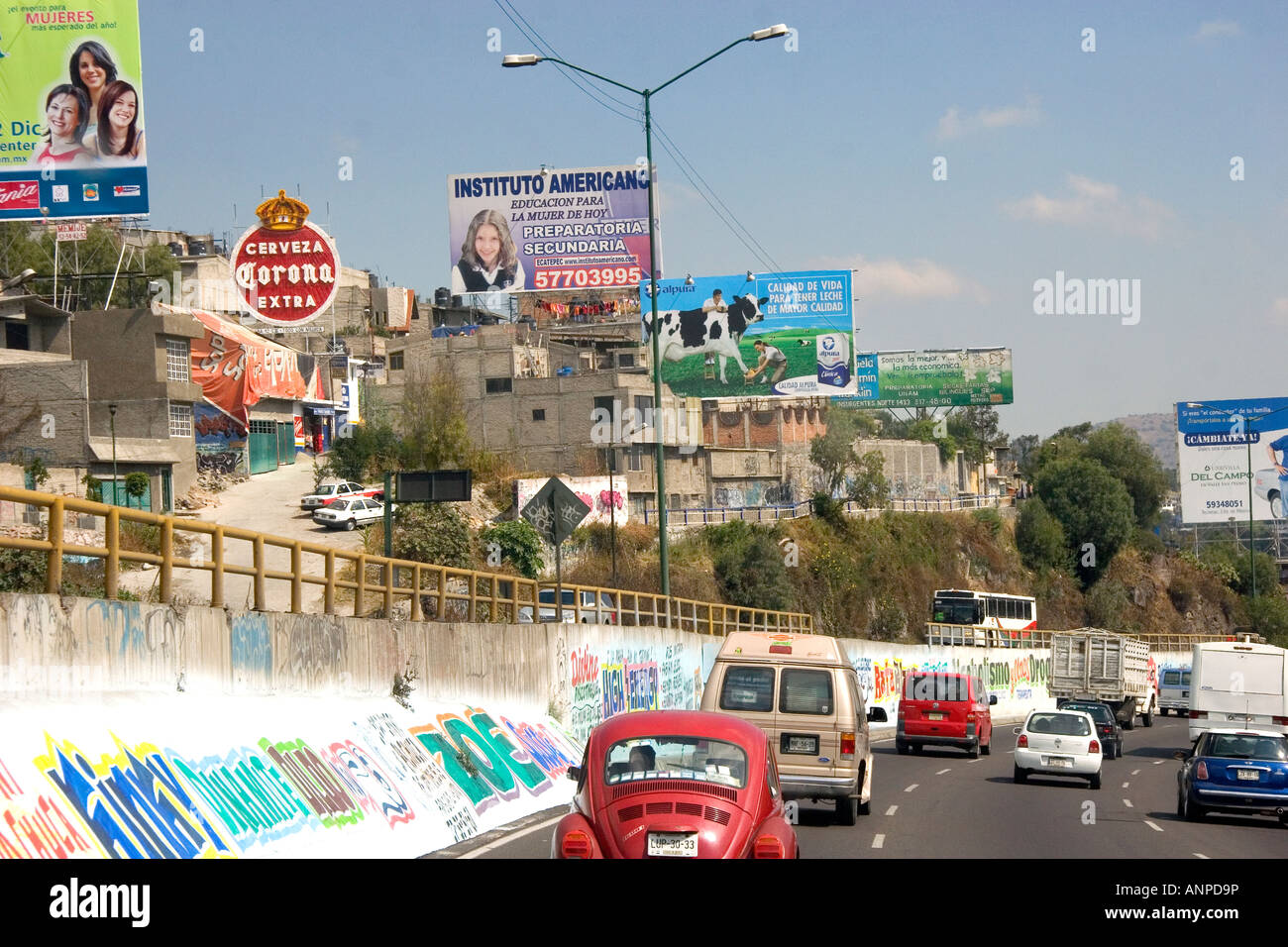 Housing and advertising signs along the highway in the State of Mexico ...