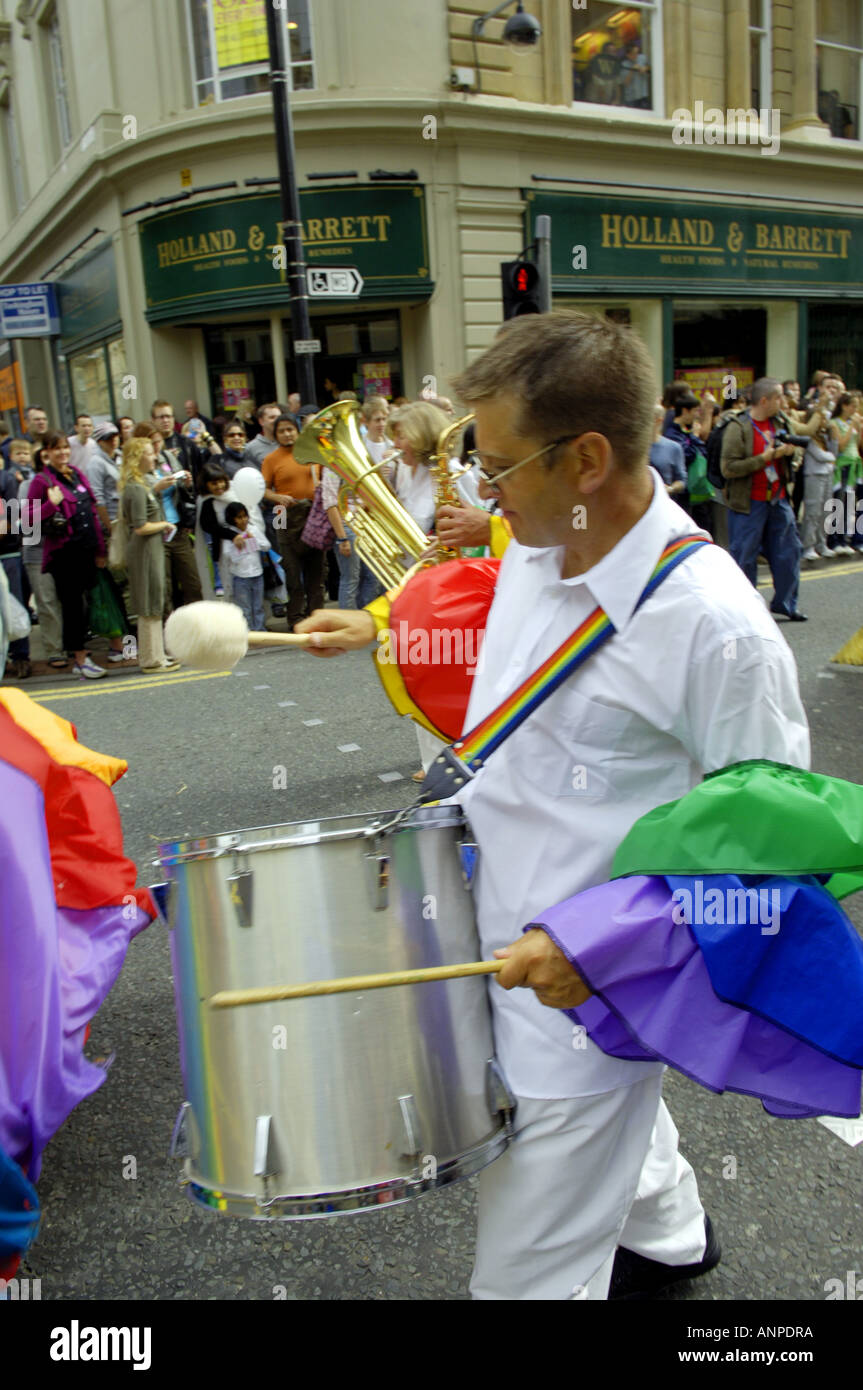 drummer male dress flamboyant extravagant colourful rainbow flag ...
