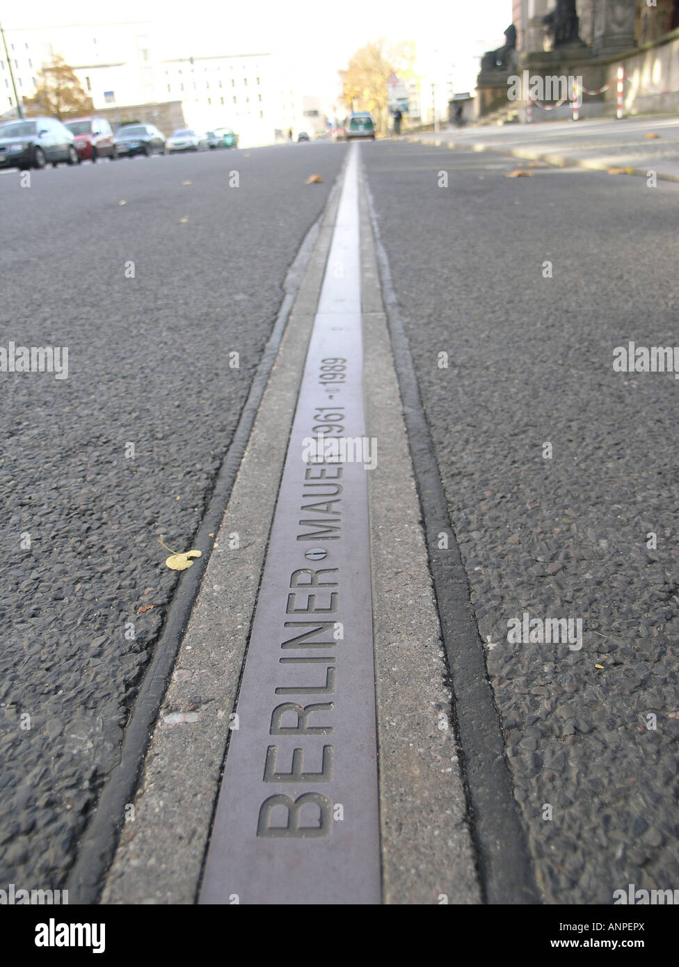 Bronze strip tracing the original path of the Berlin Wall Stock Photo ...