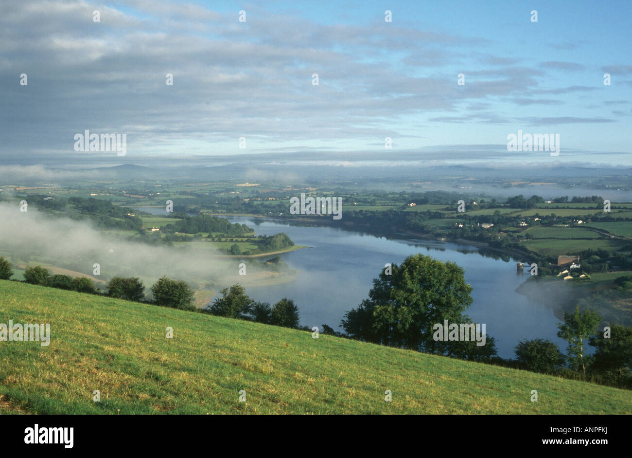 View of Lake, River and green fields, Inniscara resevoir , Cork ...