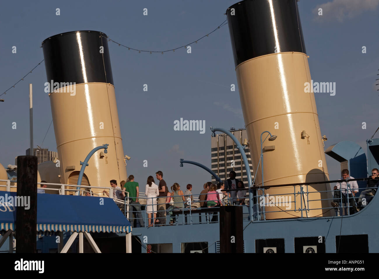 Party on Queen Mary ship on River Thames with funnels City of London ...