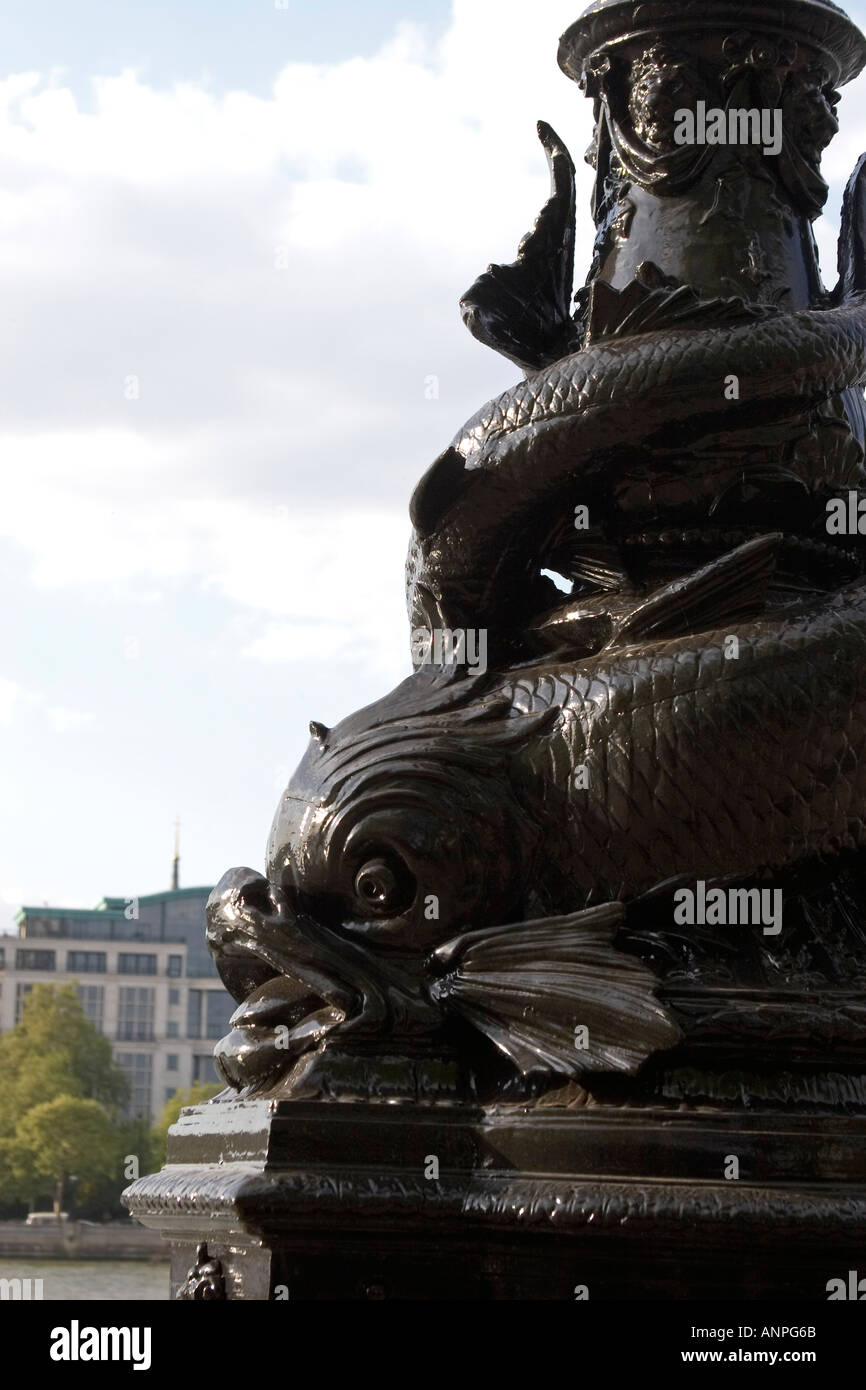 Dolphin sculpture detail on base of street lamps on Queen s Walk by ...