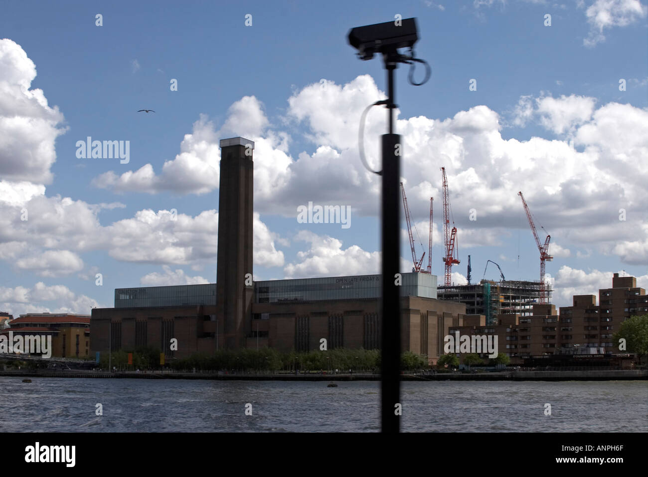 Surveillance security CCTV camera overlooking the River Thames with ...