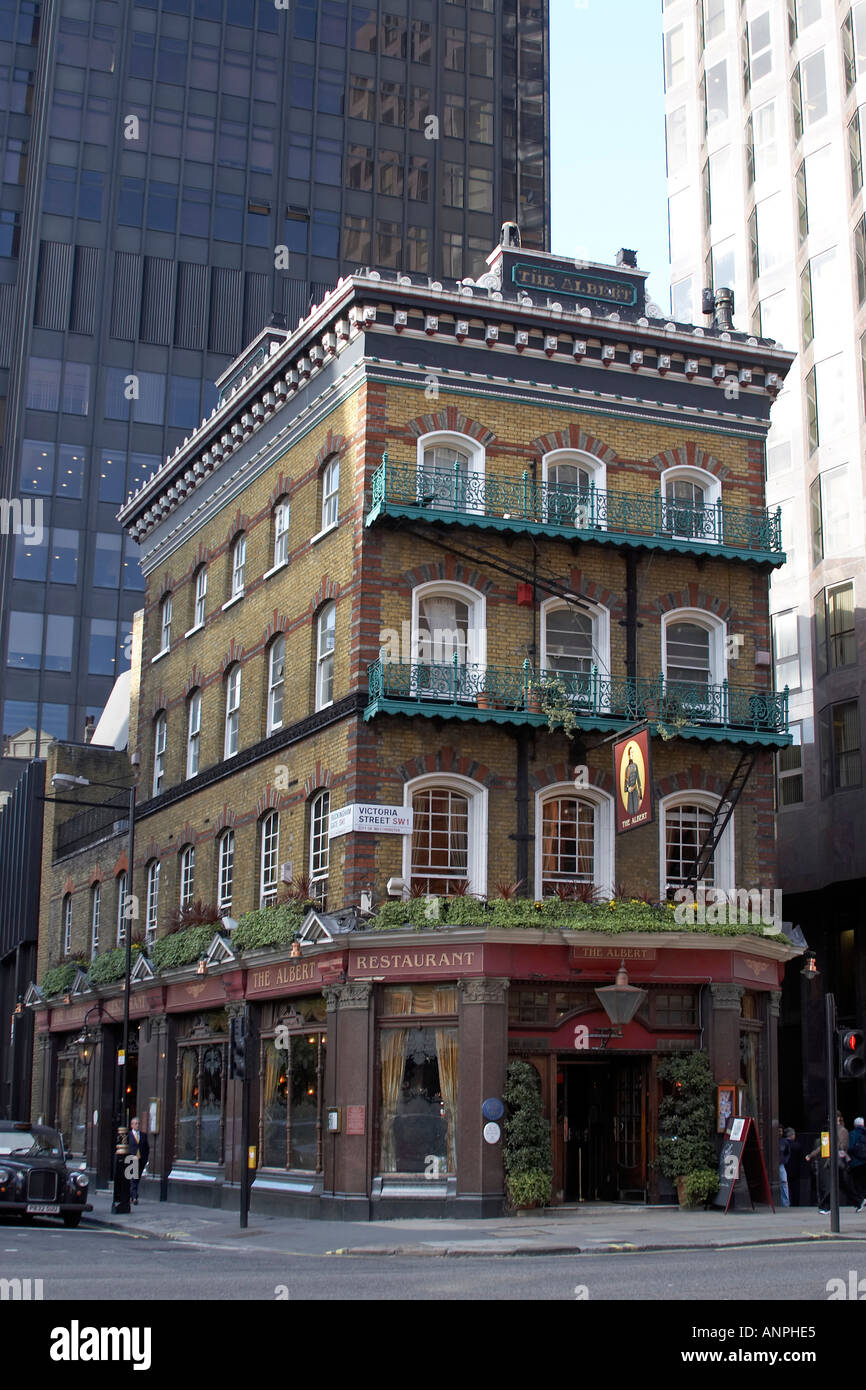 The Albert pub small old building surrounded and dwarfed by tall ...