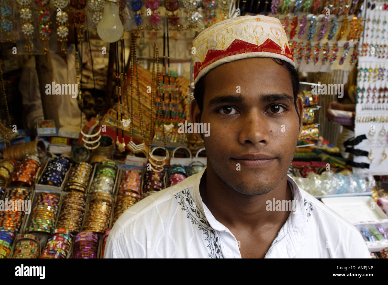 A trader stands in front of his bangle stall in Kolkata, India Stock ...