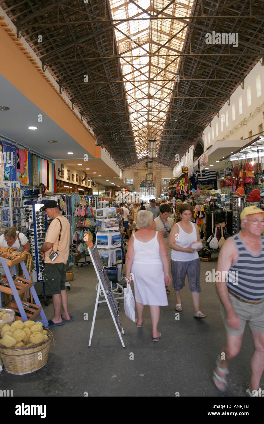 TOURISTS SHOPPING WITHIN THE INDOOR MARKET AT CHANIA. CRETE. GREEK ...