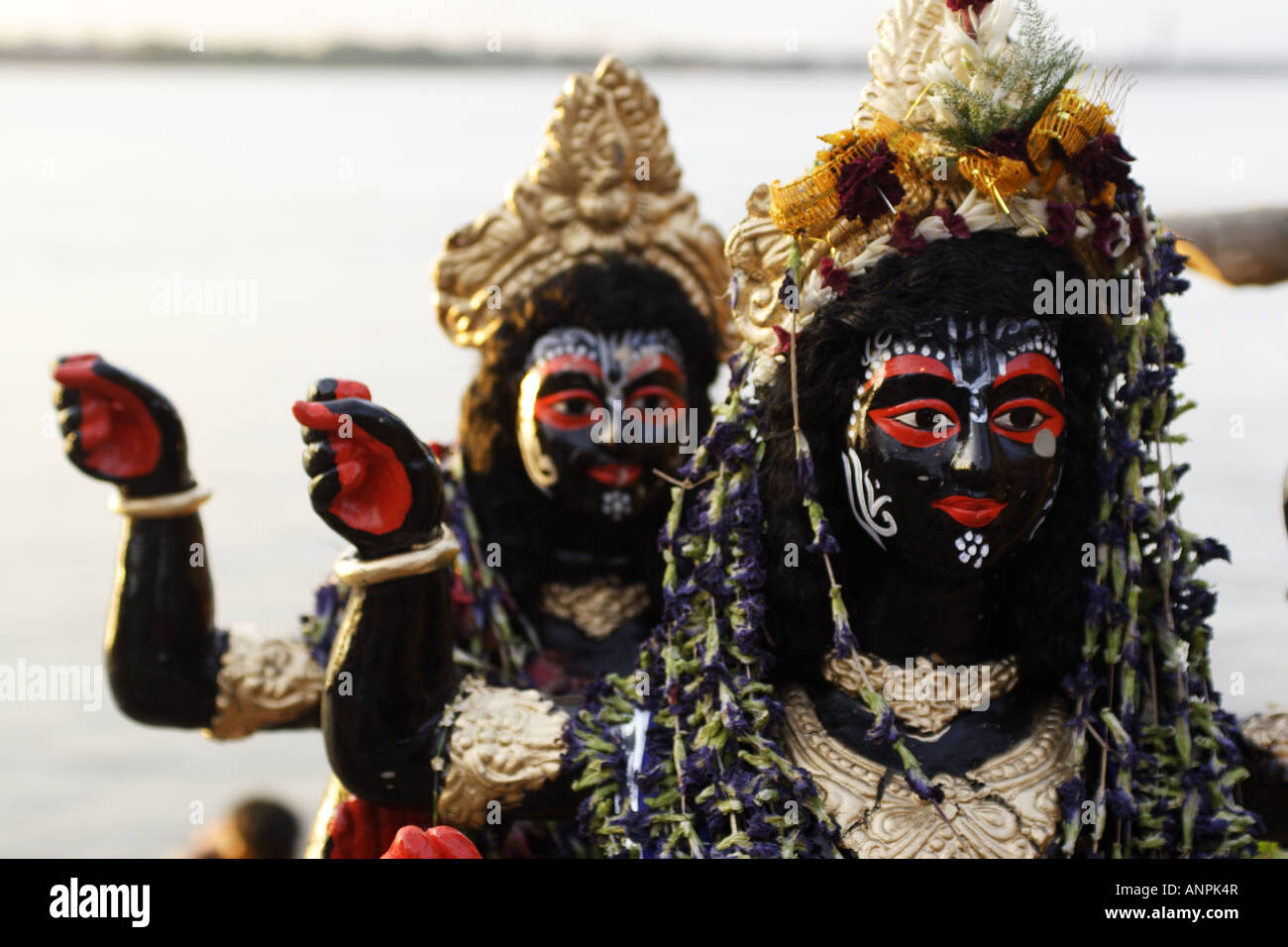 Statues of the goddess Kali stand by the Hooghly River in Kolkata ...