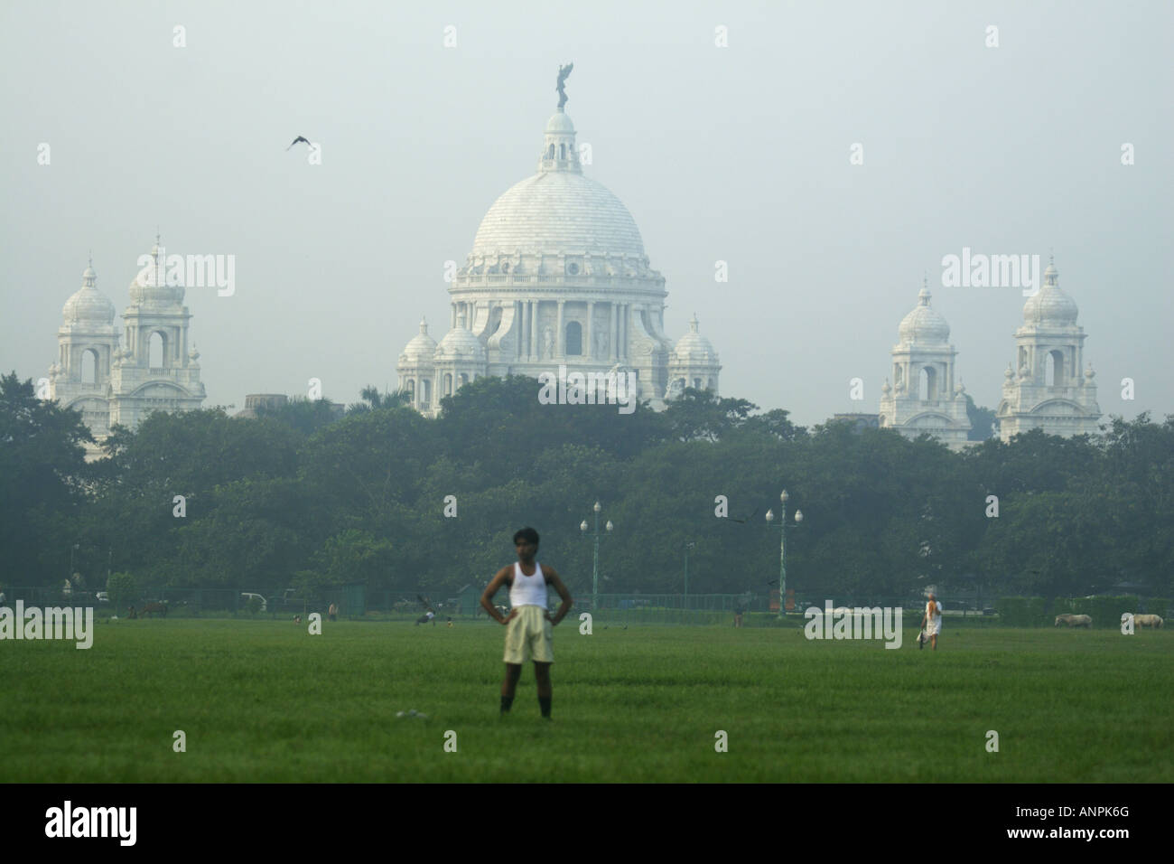 A man undertakes exercise on the Maidan in Kolkata, India. The Maidan ...