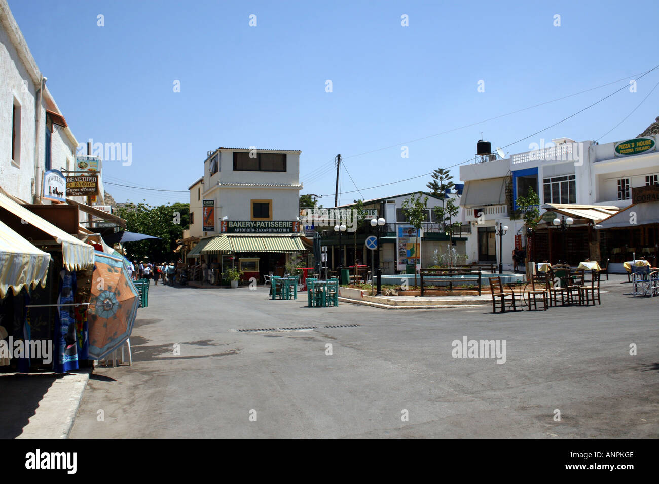THE SMALL COASTAL VILLAGE SQUARE AT MATALA. CRETE. GREEK ISLAND. EUROPE ...