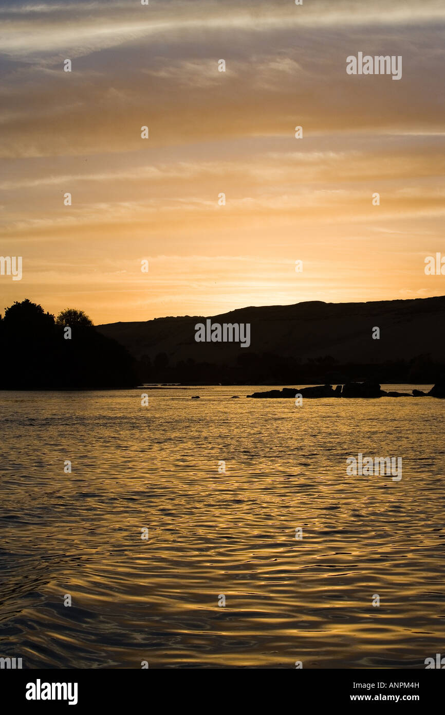 Egypt Aswan sunset over the Nile river Stock Photo - Alamy