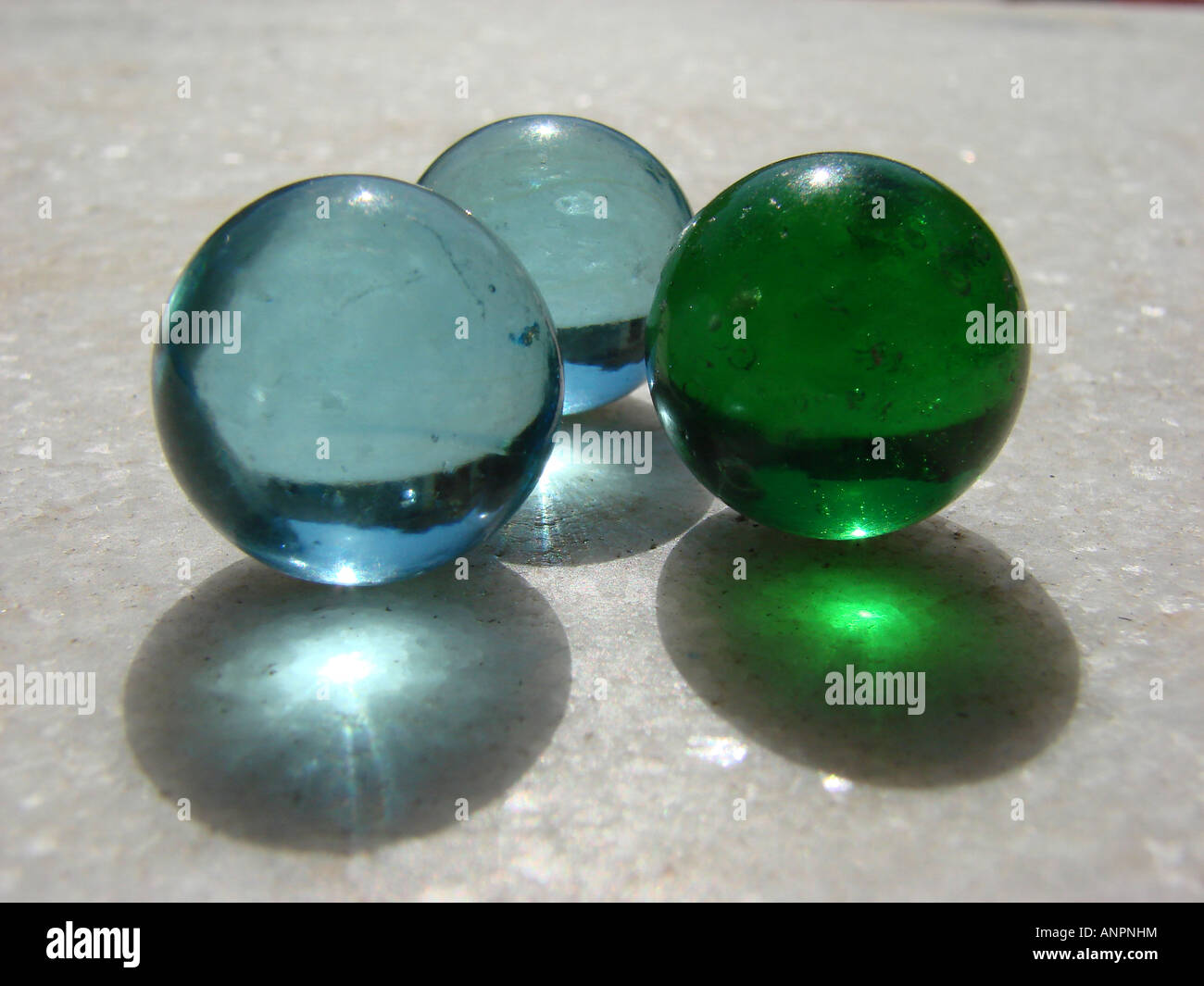Three glass balls Stock Photo - Alamy