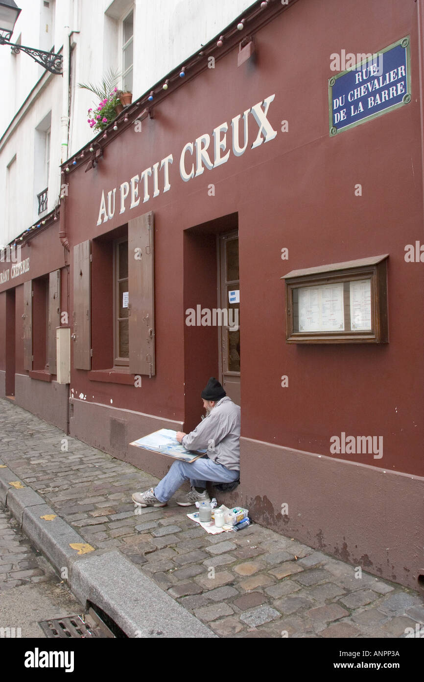 Artist at work painting Montmartre Paris France Stock Photo - Alamy
