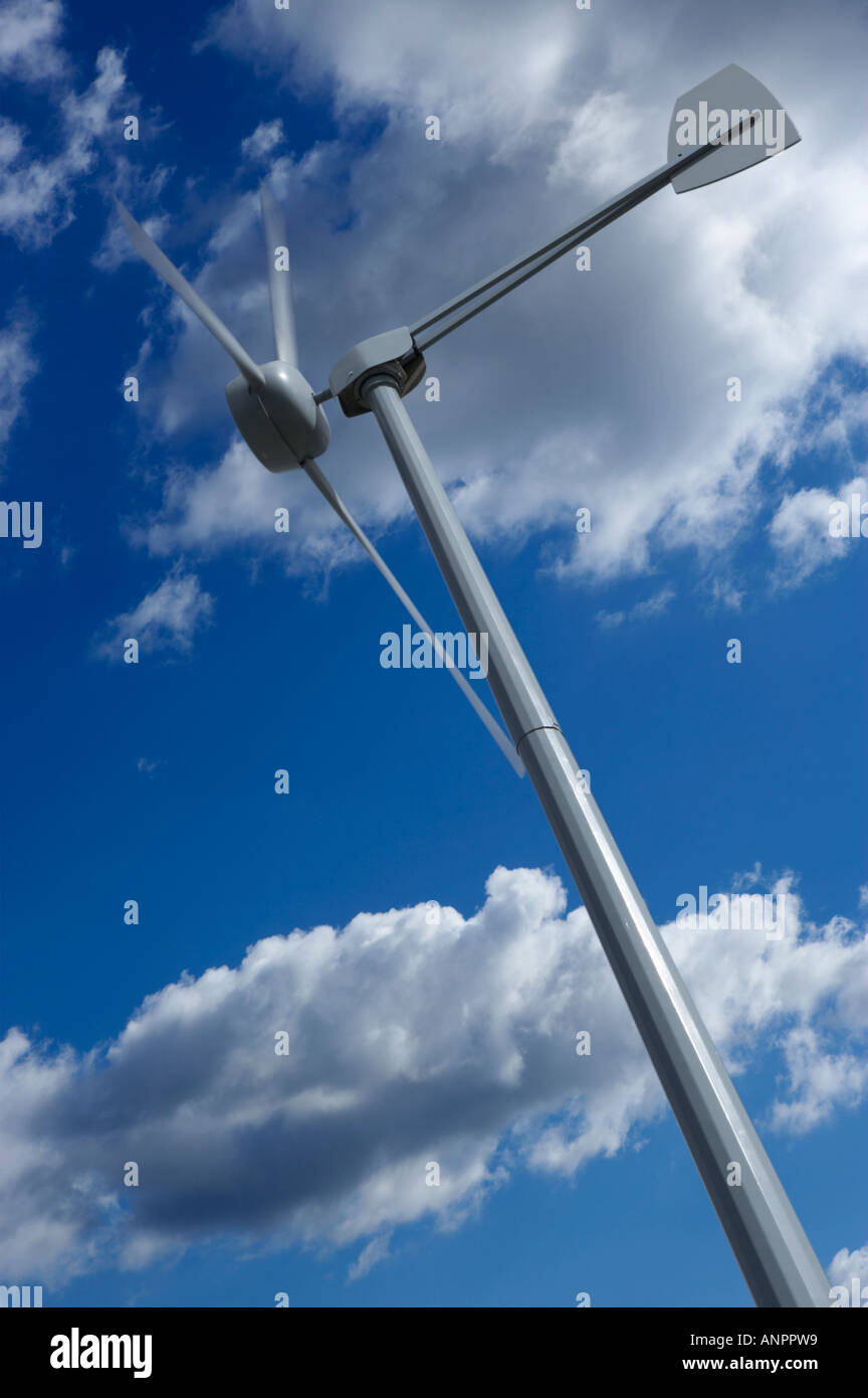 SPINNING WIND TURBINE WITH ROTATING HEAD AGAINST BLUE SKY Stock Photo ...