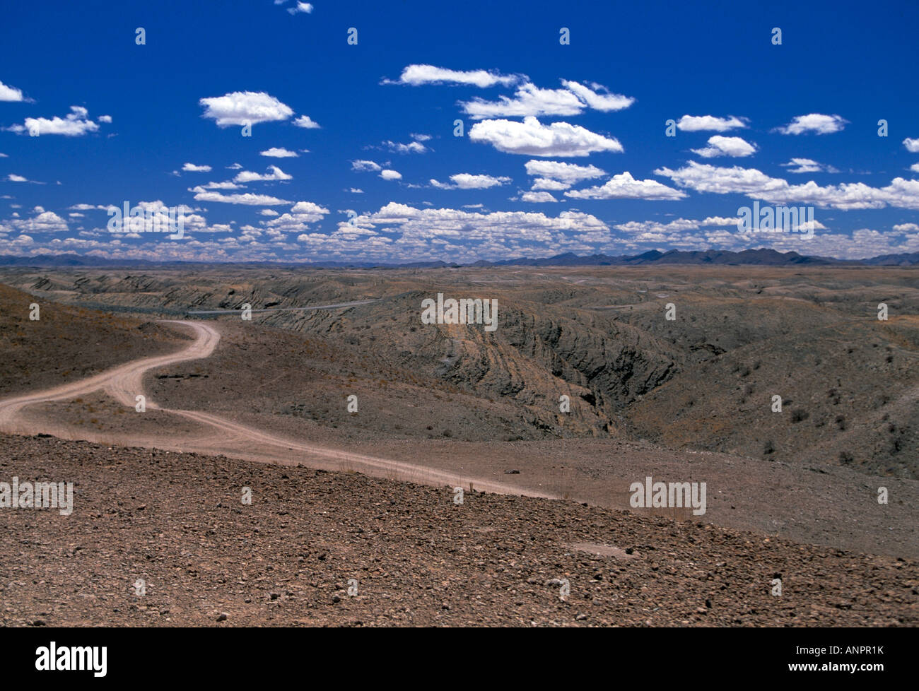 road twisting through the landscape Stock Photo - Alamy