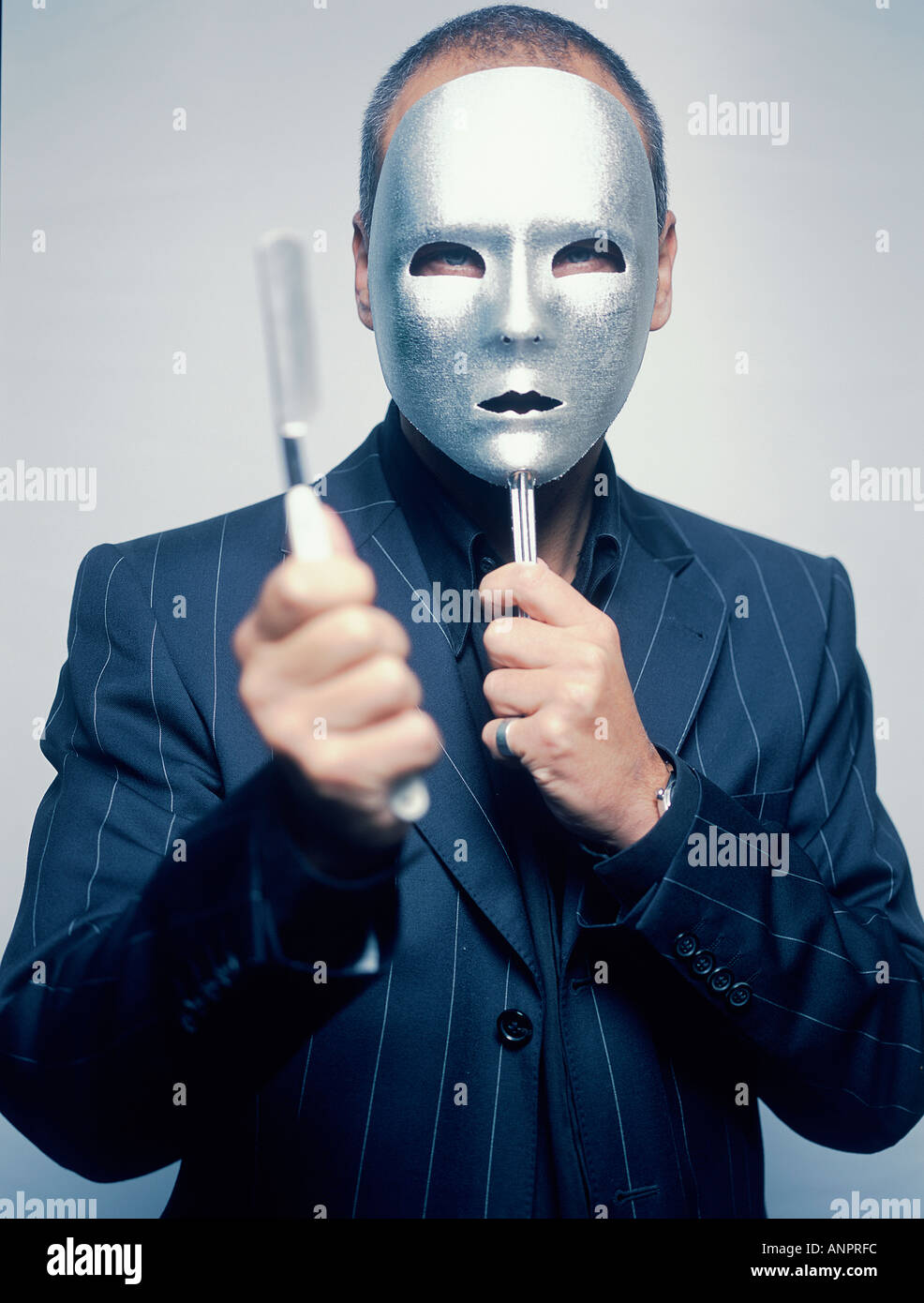 Gangster wearing mask hi-res stock photography and images - Alamy
