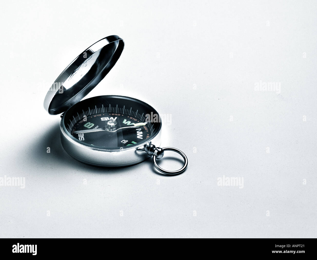 A shiny metal compass Stock Photo - Alamy