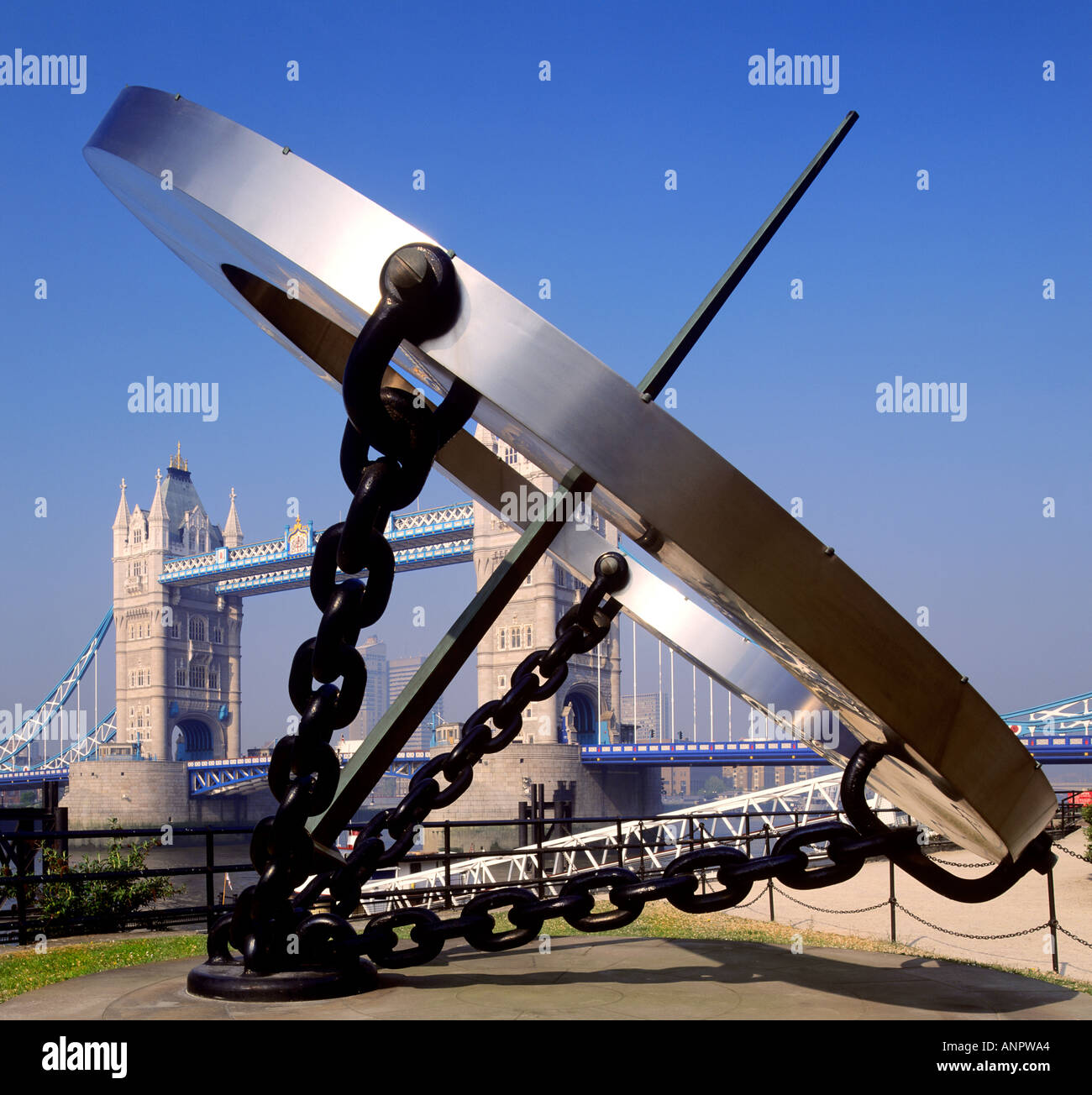 Tower Bridge with clock sundial in foreground from St Katherines Dock ...