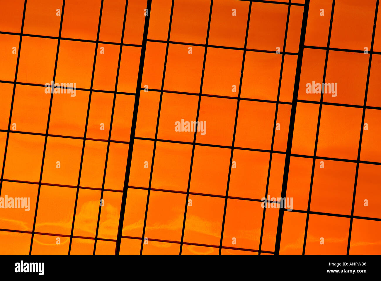 reflection of sun in building windows Stock Photo - Alamy