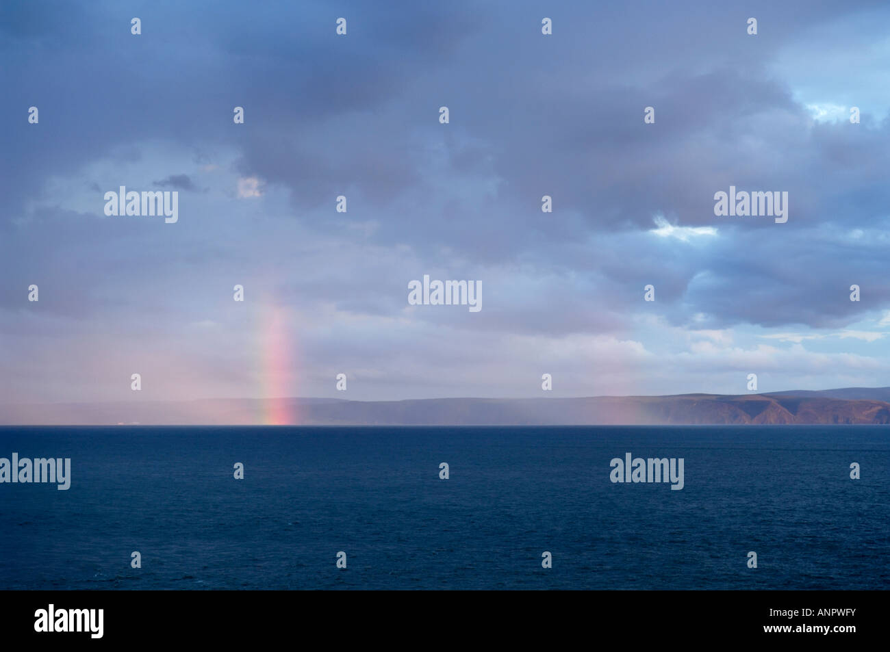 Storm clouds and a rainbow over the Bristol Channel and Somerset seen ...