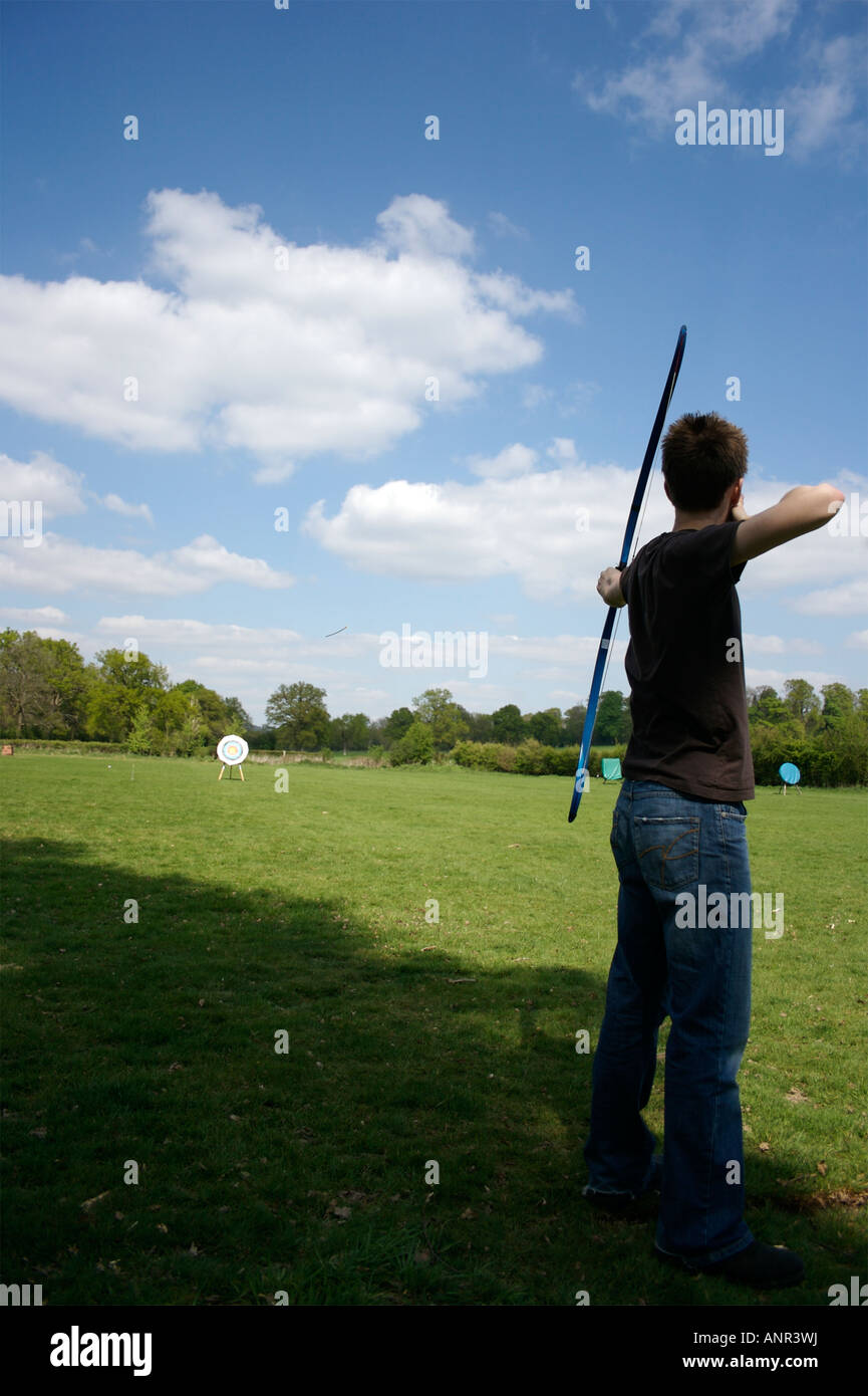An archer and an arrow in flight Stock Photo - Alamy