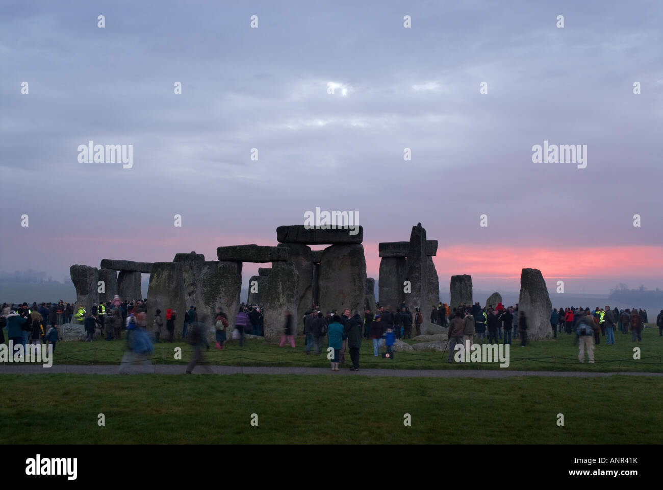 Dawn breaks and the first sign of the sun rising at Stonehenge on the ...