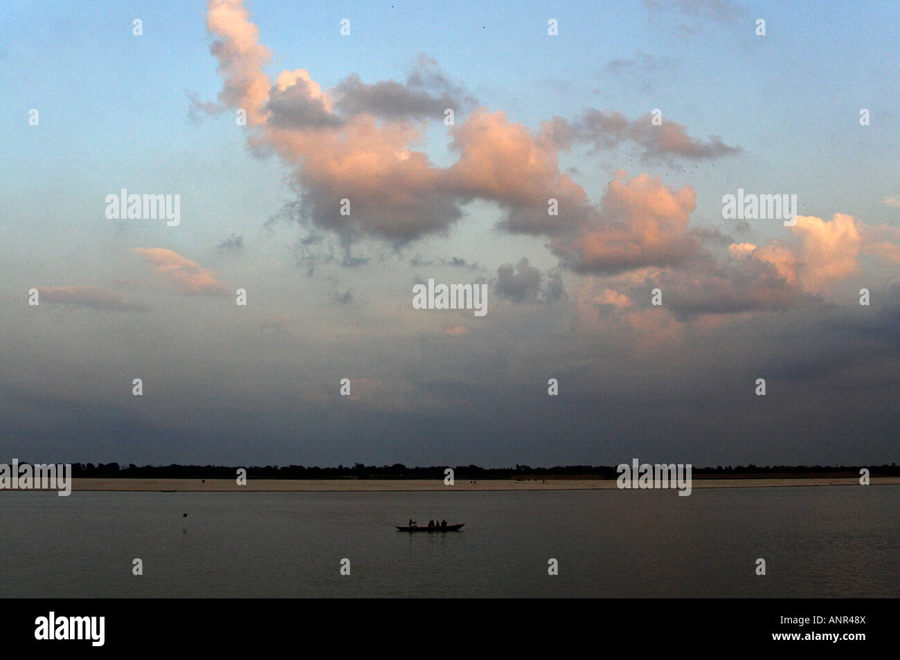 Small boat floating on the river Ganga in Varanasi, India, in the ...