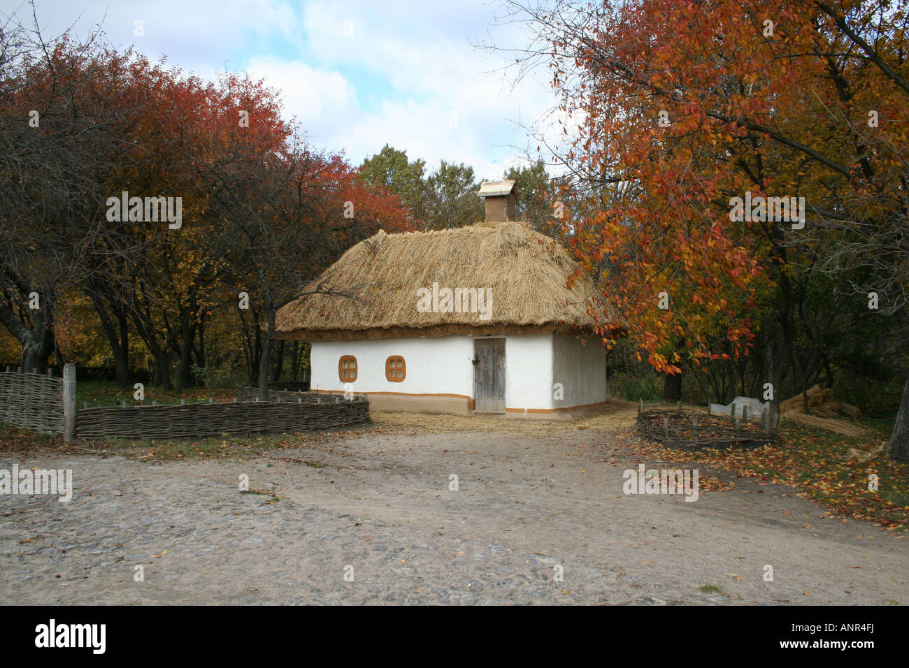 Beautiful autumn straw house Stock Photo - Alamy