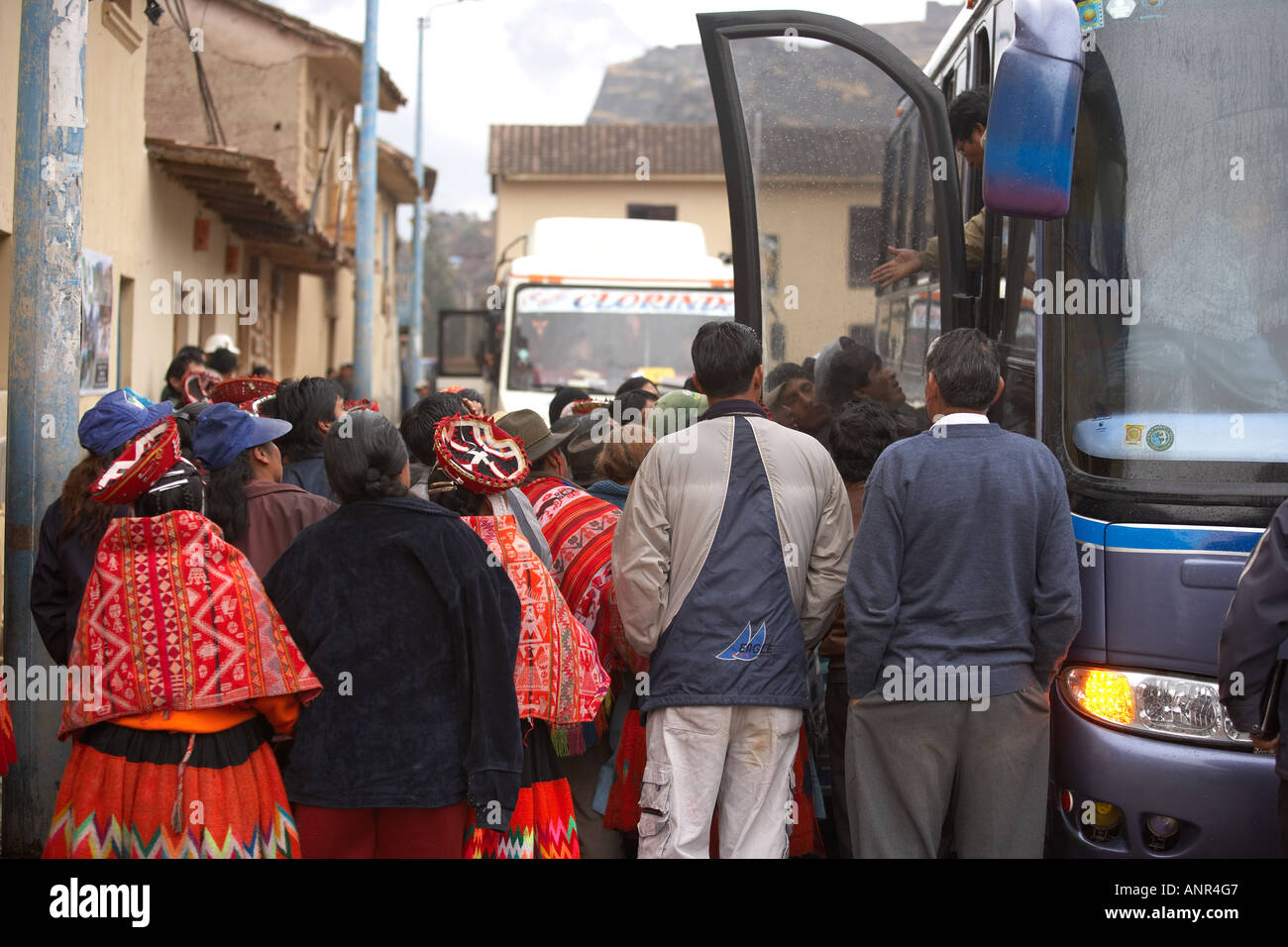 People getting on bus in Ollantaytambo Peru Stock Photo - Alamy