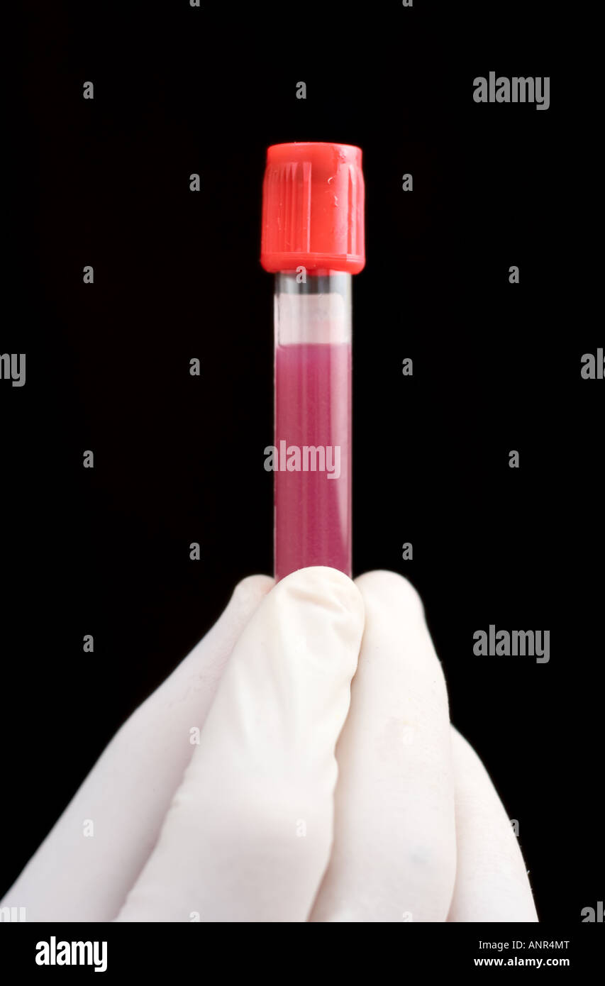 Holding a test tube Stock Photo - Alamy