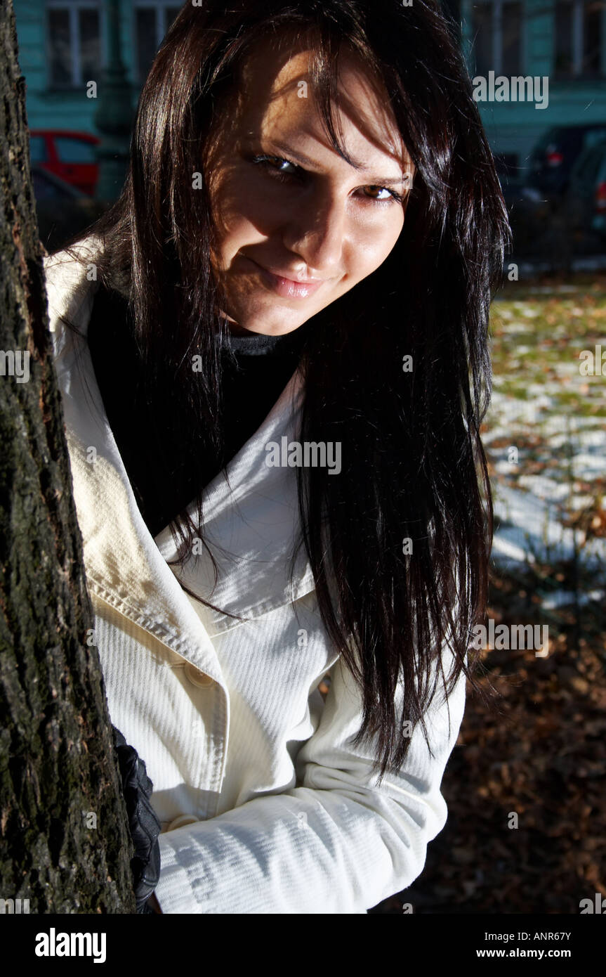 Peeking around tree hi-res stock photography and images - Alamy
