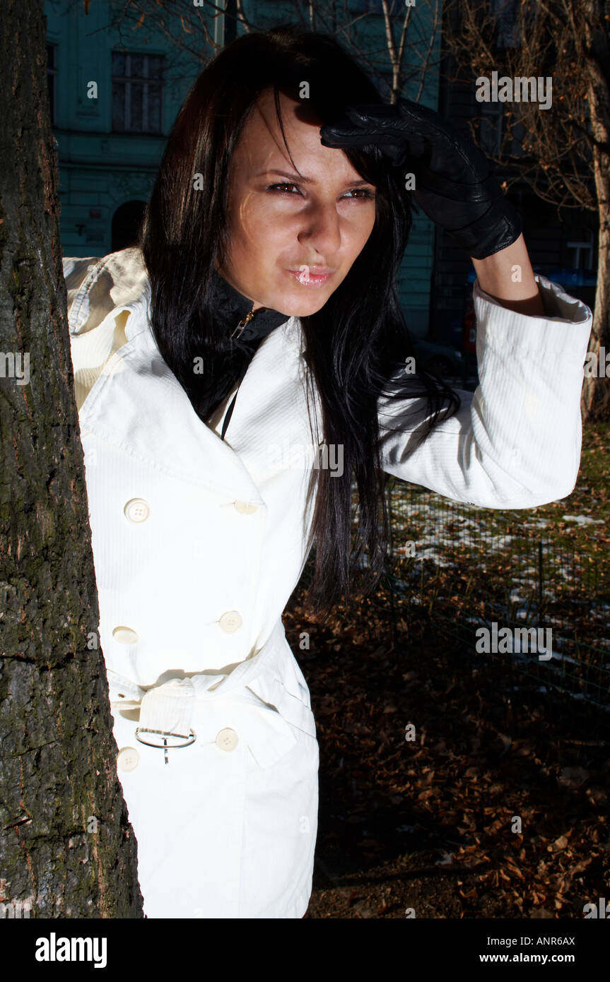 Peeking around tree hi-res stock photography and images - Alamy