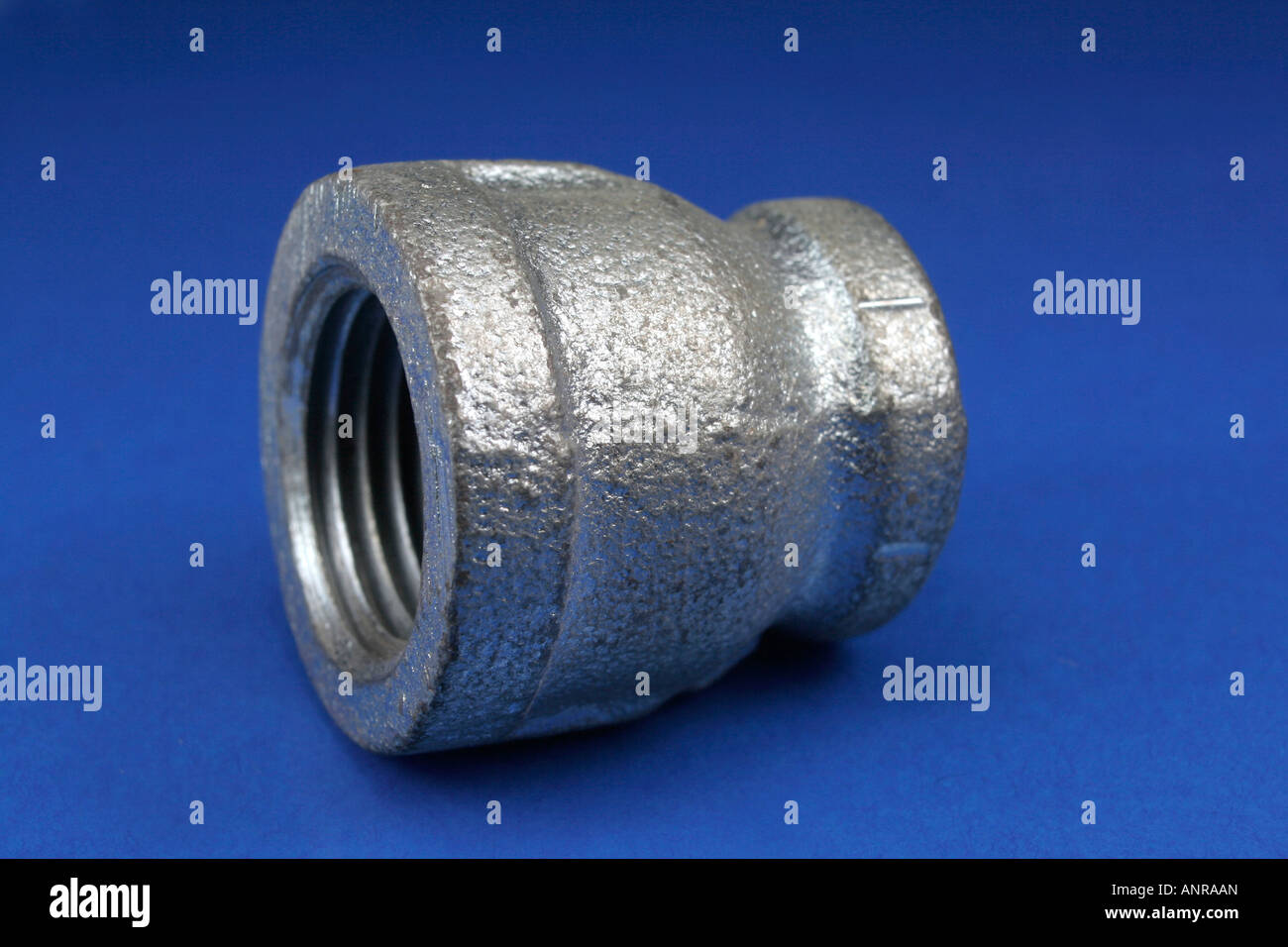 Cast iron pipe reducer Stock Photo - Alamy