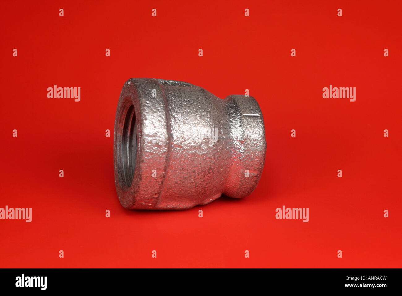 Cast iron pipe reducer Stock Photo - Alamy