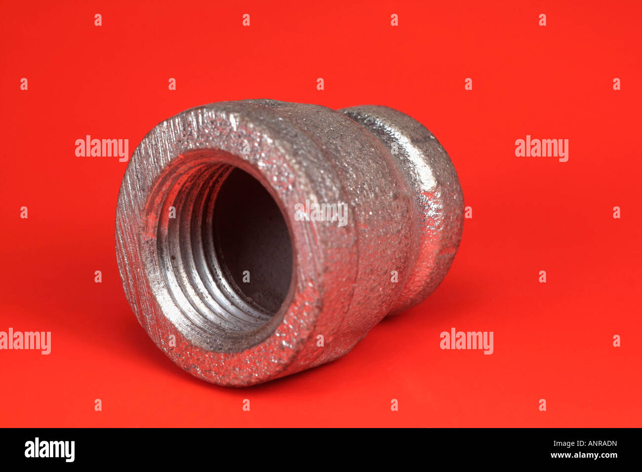 Cast iron pipe reducer Stock Photo - Alamy
