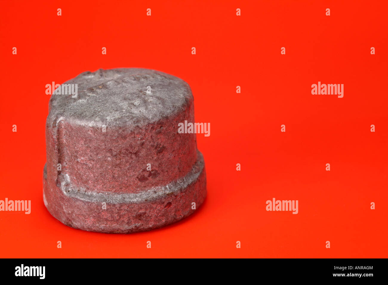 Cast iron pipe cap Stock Photo - Alamy
