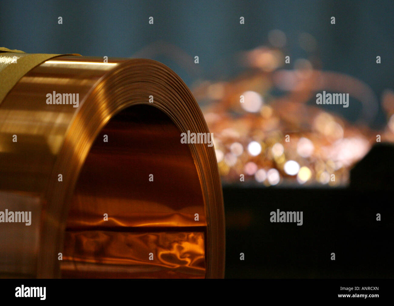 Copper Stripping Coil in a copper distribution centre Stock Photo - Alamy
