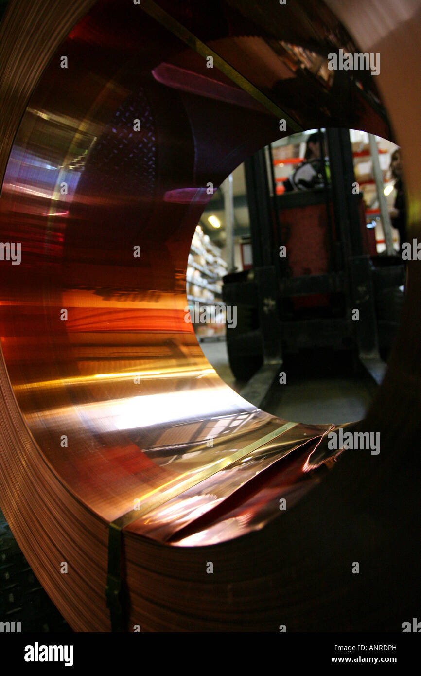 Copper Stripping Coil in a copper distribution centre Stock Photo - Alamy