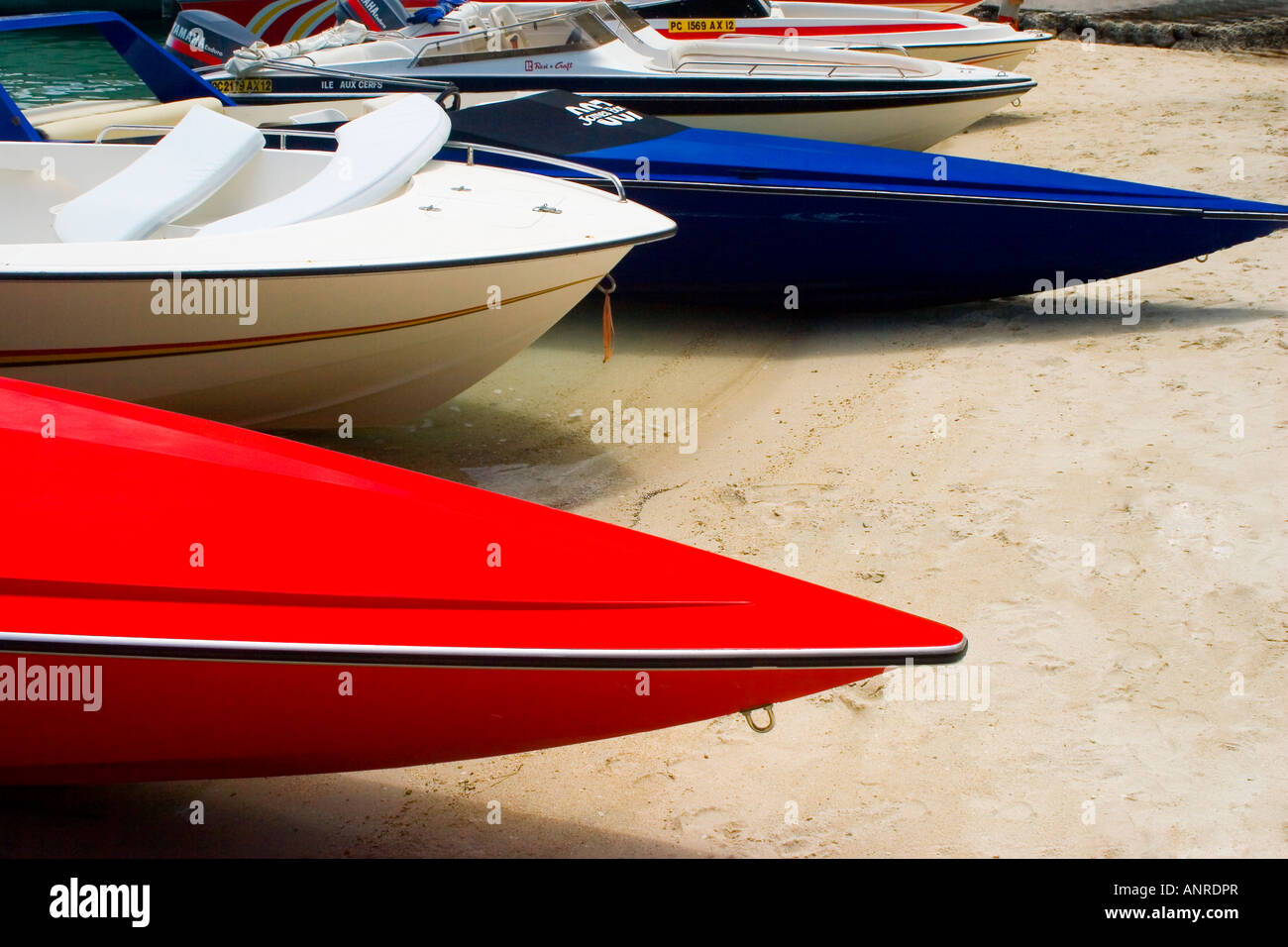 Speedboats on the beach Stock Photo - Alamy