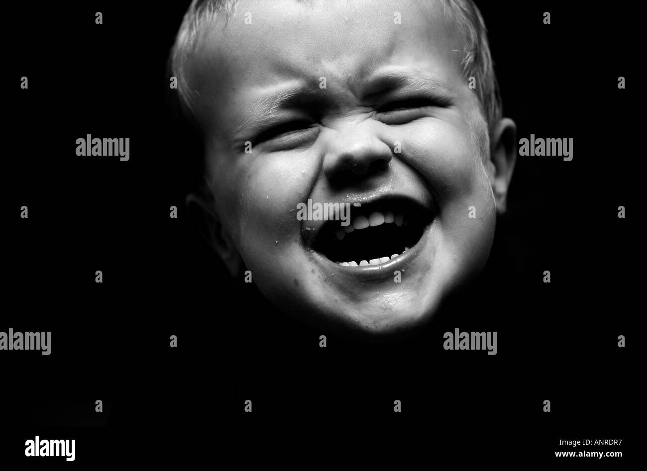 Boy moaning Black and White Stock Photos & Images - Alamy